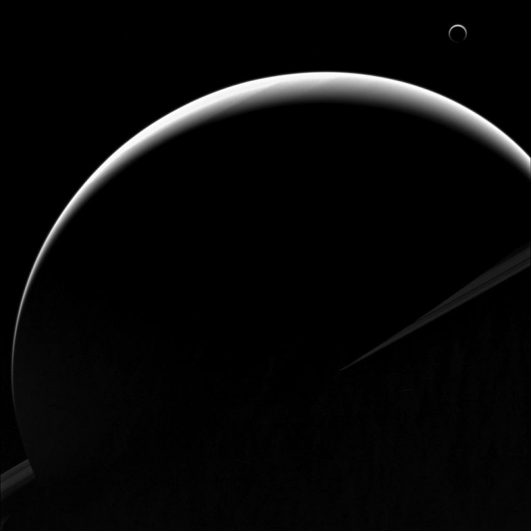 Crescent Saturn and Titan seen by Cassini – Astronomy Now