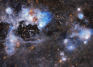 A mysterious ‘superbubble’ carved in the heart of a glowing emission ...